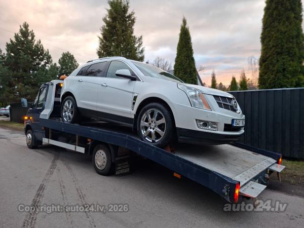White Cadillac SRX 2011 in Tallinn, with an engine capacity of 3.00 L and mileage of 0 thousand km for 600 €, photo 7 on AUTOMOTO.COM.LV