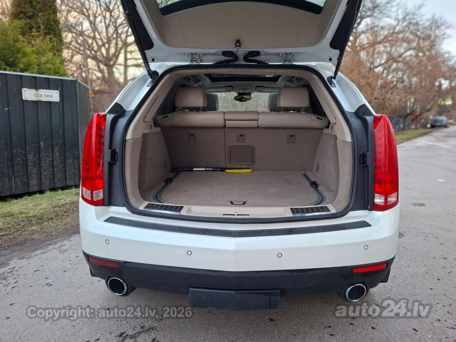 White Cadillac SRX 2011 in Tallinn, with an engine capacity of 3.00 L and mileage of 0 thousand km for 600 €, photo 15 on AUTOMOTO.COM.LV