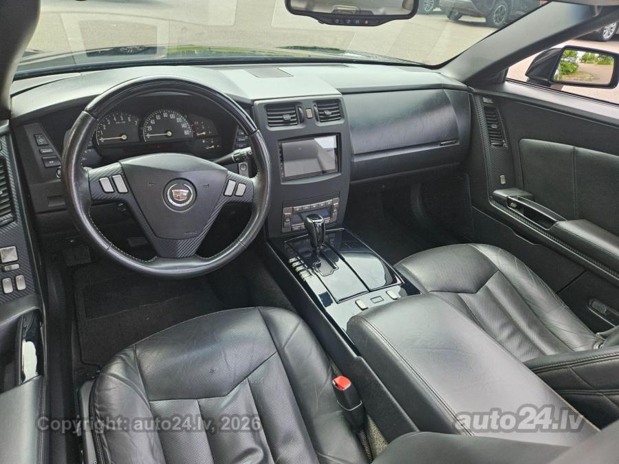 Melns Cadillac XLR 2006 Tallina, ar dzinēja tilpumu 4.60 L un nobraukumu 138 tūkst. km par 22000 €, foto 9 vietnē AUTOMOTO.COM.LV