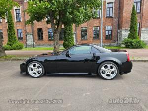Melns Cadillac XLR 2006 Tallina, ar dzinēja tilpumu 4.60 L un nobraukumu 138 tūkst. km par 22000 €, foto 12 vietnē AUTOMOTO.COM.LV