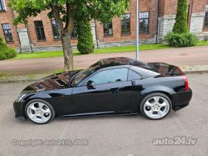 Melns Cadillac XLR 2006 Tallina, ar dzinēja tilpumu 4.60 L un nobraukumu 138 tūkst. km par 22000 €, foto 19 vietnē AUTOMOTO.COM.LV