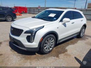 White Cadillac XT4 2019 in Vilnius, with an engine capacity of 2.00 L and mileage of 45 thousand km for 29300 €, photo  on AUTOMOTO.COM.LV