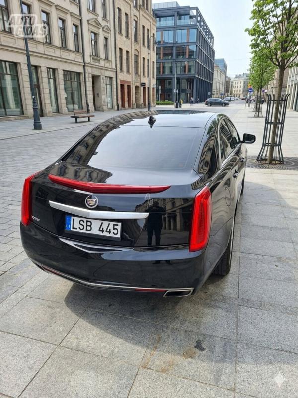 Black Cadillac XTS 2014 in Telschi, with an engine capacity of 3.60 L and mileage of 215 thousand km for 11000 €, photo 4 on AUTOMOTO.COM.LV