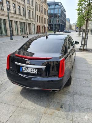 Black Cadillac XTS 2014 in Telschi, with an engine capacity of 3.60 L and mileage of 215 thousand km for 11000 €, photo 4 on AUTOMOTO.COM.LV
