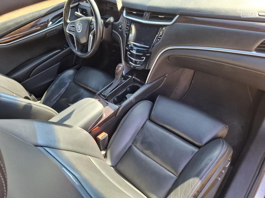 Black Cadillac XTS 2014 in Telschi, with an engine capacity of 3.60 L and mileage of 215 thousand km for 11000 €, photo 12 on AUTOMOTO.COM.LV
