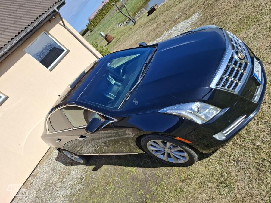Black Cadillac XTS 2014 in Telschi, with an engine capacity of 3.60 L and mileage of 215 thousand km for 11000 €, photo 14 on AUTOMOTO.COM.LV