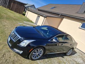 Black Cadillac XTS 2014 in Telschi, with an engine capacity of 3.60 L and mileage of 215 thousand km for 11000 €, photo 15 on AUTOMOTO.COM.LV