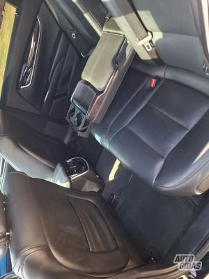 Black Cadillac XTS 2014 in Telschi, with an engine capacity of 3.60 L and mileage of 215 thousand km for 11000 €, photo 16 on AUTOMOTO.COM.LV