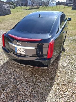 Black Cadillac XTS 2014 in Telschi, with an engine capacity of 3.60 L and mileage of 215 thousand km for 11000 €, photo 18 on AUTOMOTO.COM.LV