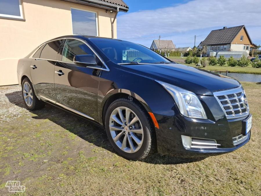 Black Cadillac XTS 2014 in Telschi, with an engine capacity of 3.60 L and mileage of 215 thousand km for 11000 €, photo 21 on AUTOMOTO.COM.LV