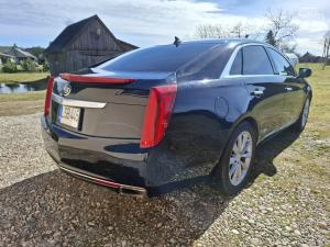 Black Cadillac XTS 2014 in Telschi, with an engine capacity of 3.60 L and mileage of 215 thousand km for 11000 €, photo 23 on AUTOMOTO.COM.LV