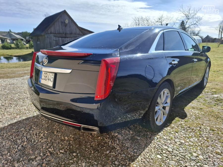 Black Cadillac XTS 2014 in Telschi, with an engine capacity of 3.60 L and mileage of 215 thousand km for 11000 €, photo 23 on AUTOMOTO.COM.LV