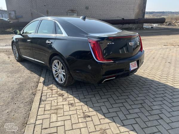Black Cadillac XTS 2019 in Alytus, with an engine capacity of 3.60 L and mileage of 235 thousand km for 11500 €, photo 7 on AUTOMOTO.COM.LV