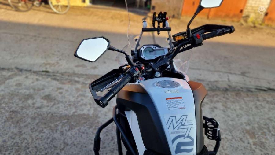 White CFMOTO 650 MT 2020 in Visaginas, with an engine capacity of 0.65 L and mileage of 23 thousand km for 3990 €, photo 6 on AUTOMOTO.COM.LV