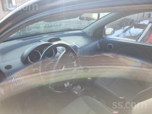 Melns Chevrolet Aveo 2007 Cēsis, ar dzinēja tilpumu 1.40 L un nobraukumu 130 tūkst. km par 700 €, foto 9 vietnē AUTOMOTO.COM.LV
