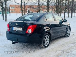 Black Chevrolet Aveo 2012 in Tallinn, with an engine capacity of 1.40 L and mileage of 318 thousand km for 1990 €, photo 3 on AUTOMOTO.COM.LV