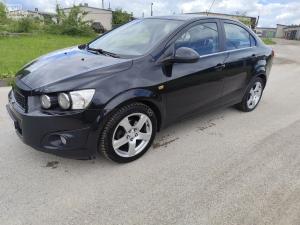 Black Chevrolet Aveo 2013 in Pakruojis, with an engine capacity of 1.60 L and mileage of 140 thousand km for 2999 €, photo 3 on AUTOMOTO.COM.LV