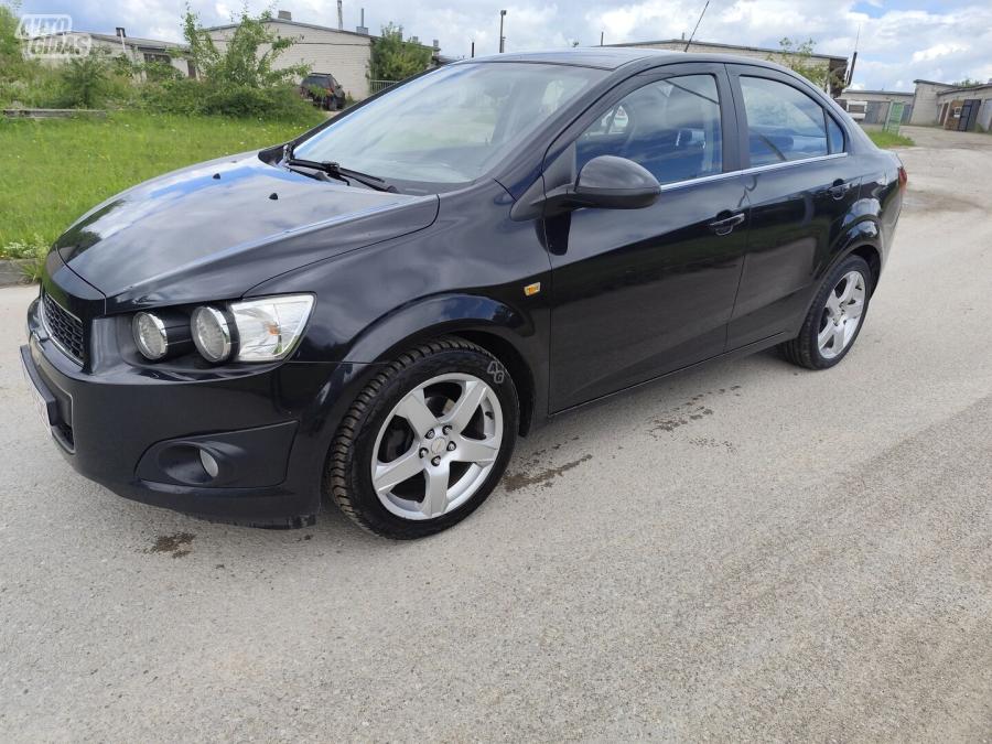 Black Chevrolet Aveo 2013 in Pakruojis, with an engine capacity of 1.60 L and mileage of 140 thousand km for 2999 €, photo 3 on AUTOMOTO.COM.LV