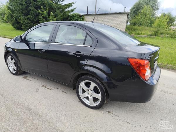 Black Chevrolet Aveo 2013 in Pakruojis, with an engine capacity of 1.60 L and mileage of 140 thousand km for 2999 €, photo 3 on AUTOMOTO.COM.LV