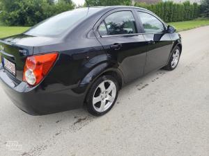Black Chevrolet Aveo 2013 in Pakruojis, with an engine capacity of 1.60 L and mileage of 140 thousand km for 2999 €, photo 6 on AUTOMOTO.COM.LV