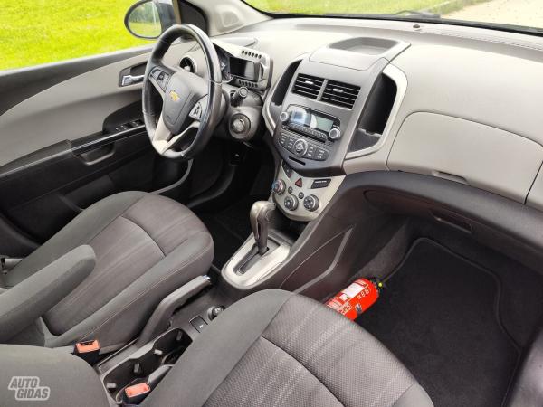 Black Chevrolet Aveo 2013 in Pakruojis, with an engine capacity of 1.60 L and mileage of 140 thousand km for 2999 €, photo 7 on AUTOMOTO.COM.LV