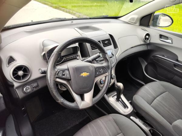 Black Chevrolet Aveo 2013 in Pakruojis, with an engine capacity of 1.60 L and mileage of 140 thousand km for 2999 €, photo 8 on AUTOMOTO.COM.LV