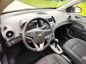 Black Chevrolet Aveo 2013 in Pakruojis, with an engine capacity of 1.60 L and mileage of 140 thousand km for 2999 €, photo 9 on AUTOMOTO.COM.LV