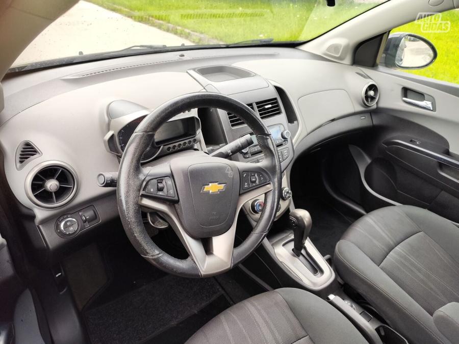 Black Chevrolet Aveo 2013 in Pakruojis, with an engine capacity of 1.60 L and mileage of 140 thousand km for 2999 €, photo 9 on AUTOMOTO.COM.LV