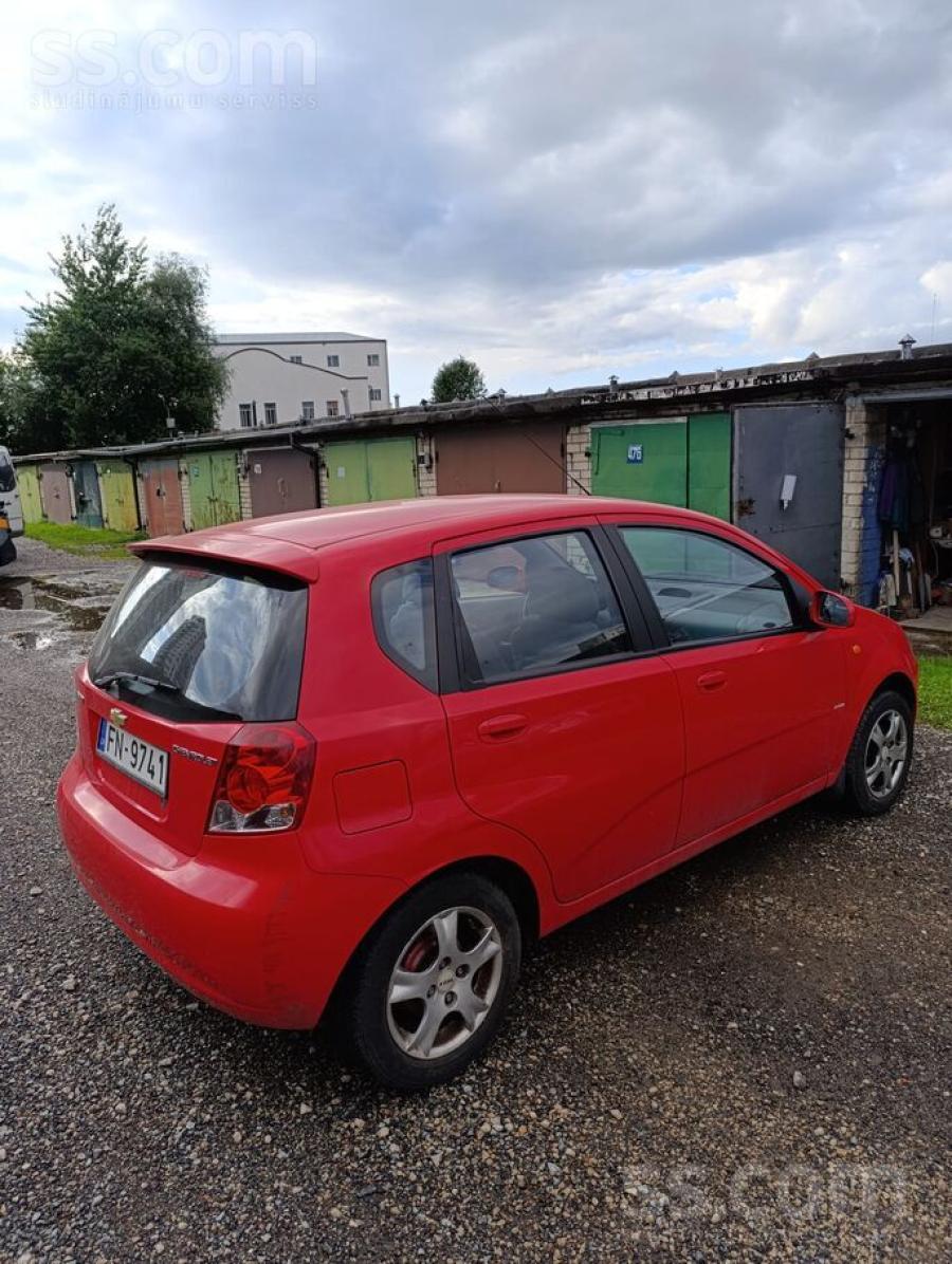 Red Chevrolet Aveo 2005 in Riga, with an engine capacity of 1.40 L and mileage of 50 thousand km for 2500 €, photo 2 on AUTOMOTO.COM.LV