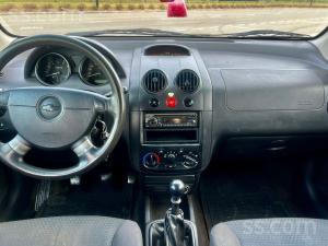 Red Chevrolet Aveo 2007 in Riga, with an engine capacity of 1.40 L and mileage of 209 thousand km for 810 €, photo 6 on AUTOMOTO.COM.LV