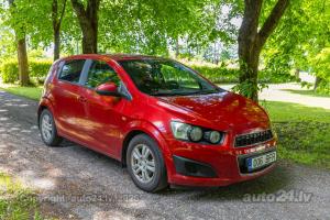 Sarkans Chevrolet Aveo 2011 Kivieli, ar dzinēja tilpumu 1.40 L un nobraukumu 201 tūkst. km par 1699 €, foto  vietnē AUTOMOTO.COM.LV