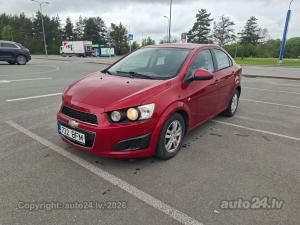 Sarkans Chevrolet Aveo 2011 Tallina, ar dzinēja tilpumu 1.40 L un nobraukumu 100 tūkst. km par 1499 €, foto 6 vietnē AUTOMOTO.COM.LV