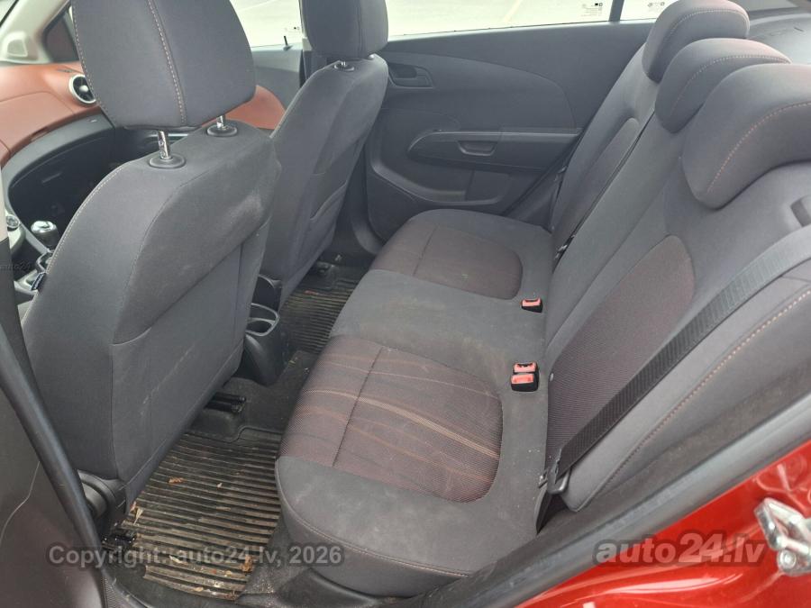 Sarkans Chevrolet Aveo 2011 Tallina, ar dzinēja tilpumu 1.40 L un nobraukumu 100 tūkst. km par 1499 €, foto 9 vietnē AUTOMOTO.COM.LV