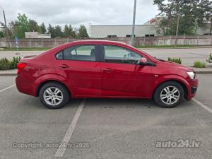Sarkans Chevrolet Aveo 2011 Tallina, ar dzinēja tilpumu 1.40 L un nobraukumu 100 tūkst. km par 1499 €, foto 10 vietnē AUTOMOTO.COM.LV