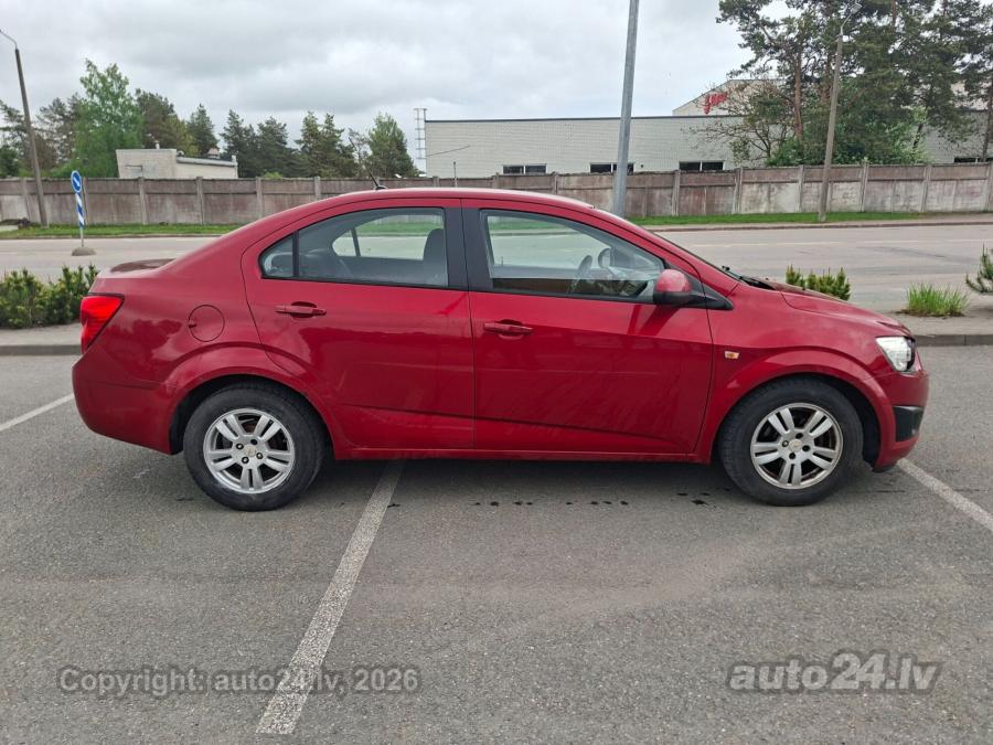 Sarkans Chevrolet Aveo 2011 Tallina, ar dzinēja tilpumu 1.40 L un nobraukumu 100 tūkst. km par 1499 €, foto 10 vietnē AUTOMOTO.COM.LV