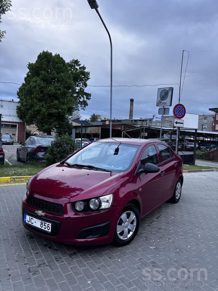 Red Chevrolet Aveo 2012 in Riga, with an engine capacity of 1.20 L and mileage of 121 thousand km for 1700 €, photo 1 on AUTOMOTO.COM.LV