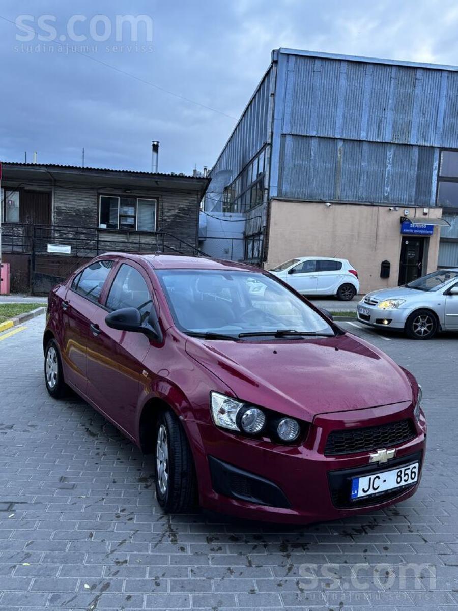 Red Chevrolet Aveo 2012 in Riga, with an engine capacity of 1.20 L and mileage of 121 thousand km for 1700 €, photo 2 on AUTOMOTO.COM.LV