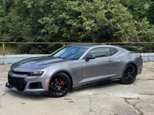 Grey Chevrolet Camaro 2019 in Vilnius, with an engine capacity of 2.00 L and mileage of 141 thousand km for 18900 €, photo 15 on AUTOMOTO.COM.LV