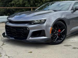 Grey Chevrolet Camaro 2019 in Vilnius, with an engine capacity of 2.00 L and mileage of 141 thousand km for 18900 €, photo 16 on AUTOMOTO.COM.LV