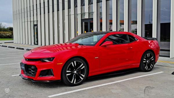 Red Chevrolet Camaro 2015 in Vilnius, with an engine capacity of 3.60 L and mileage of 155 thousand km for 13990 €, photo 11 on AUTOMOTO.COM.LV