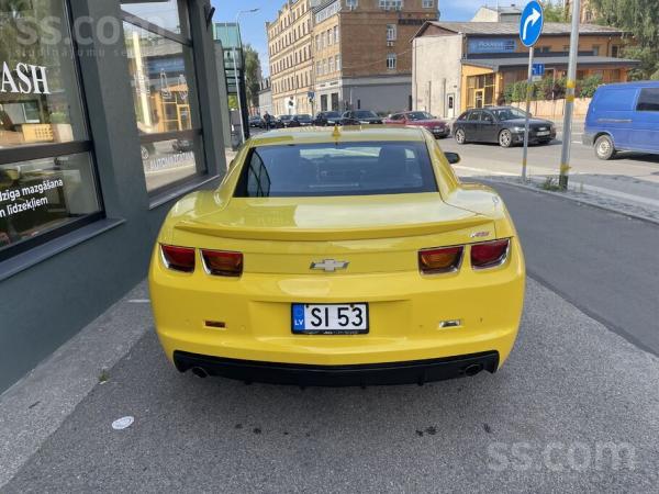 Yellow Chevrolet Camaro 2012 in Riga, with an engine capacity of 3.60 L and mileage of 94 thousand km for 12750 €, photo 6 on AUTOMOTO.COM.LV