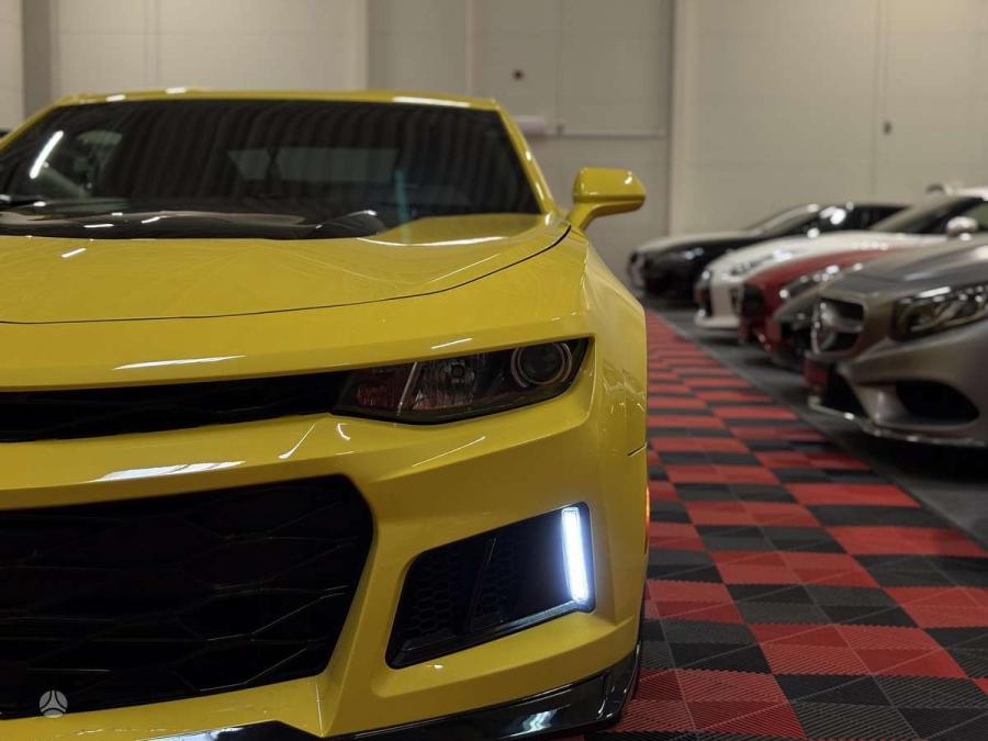Dzeltens Chevrolet Camaro 2017 Viļņa, ar dzinēja tilpumu 2.00 L un nobraukumu 81 tūkst. km par 17990 €, foto 8 vietnē AUTOMOTO.COM.LV