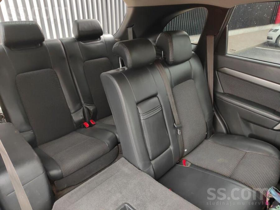Black Chevrolet Captiva 2007 in Riga, with an engine capacity of 2.00 L and mileage of 243 thousand km for 1770 €, photo 13 on AUTOMOTO.COM.LV