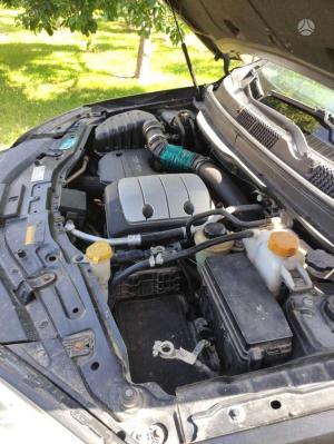 Black Chevrolet Captiva 2007 in Panevezys, with an engine capacity of 1.99 L and mileage of 330 thousand km for 1200 €, photo 3 on AUTOMOTO.COM.LV
