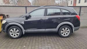 Black Chevrolet Captiva 2008 in Marijampole, with an engine capacity of 2.40 L and mileage of 200 thousand km for 1799 €, photo 2 on AUTOMOTO.COM.LV
