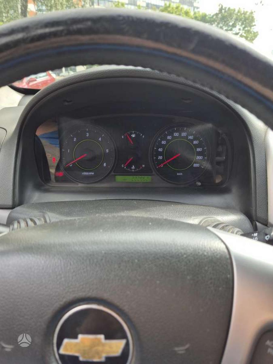Black Chevrolet Captiva 2010 in Panevezys, with an engine capacity of 1.99 L and mileage of 223 thousand km for 2900 €, photo 12 on AUTOMOTO.COM.LV