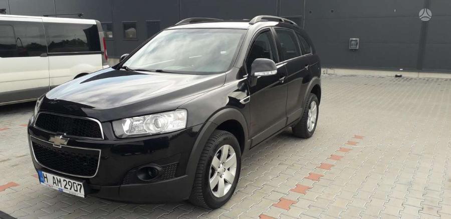 Black Chevrolet Captiva 2012 in Siauliai, with an engine capacity of 2.20 L and mileage of 235 thousand km for 4999 €, photo 1 on AUTOMOTO.COM.LV