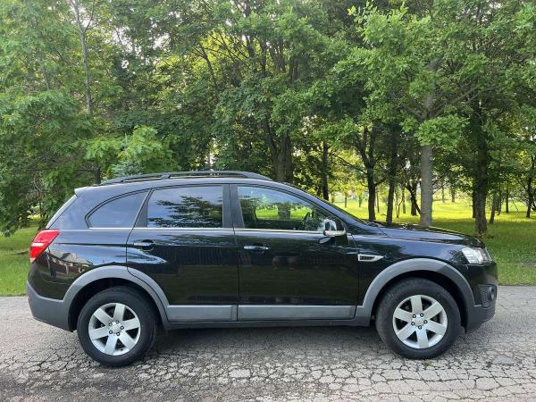 Black Chevrolet Captiva 2013 in Kaunas, with an engine capacity of 0.00 L and mileage of 212 thousand km for 5300 €, photo 6 on AUTOMOTO.COM.LV