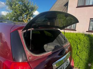 Red Chevrolet Captiva 2007 in Plunge, with an engine capacity of 1.99 L and mileage of 280 thousand km for 1350 €, photo 6 on AUTOMOTO.COM.LV