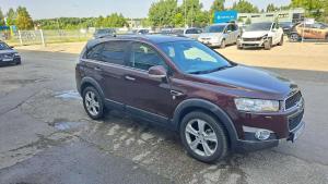 Red Chevrolet Captiva 2011 in Panevezys, with an engine capacity of 2.20 L and mileage of 221 thousand km for 4700 €, photo 5 on AUTOMOTO.COM.LV